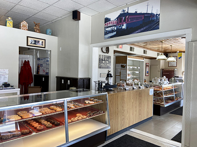 The bakery's interior balances efficiency with charm, where generations have stood deciding between "one of each" or "two of everything."