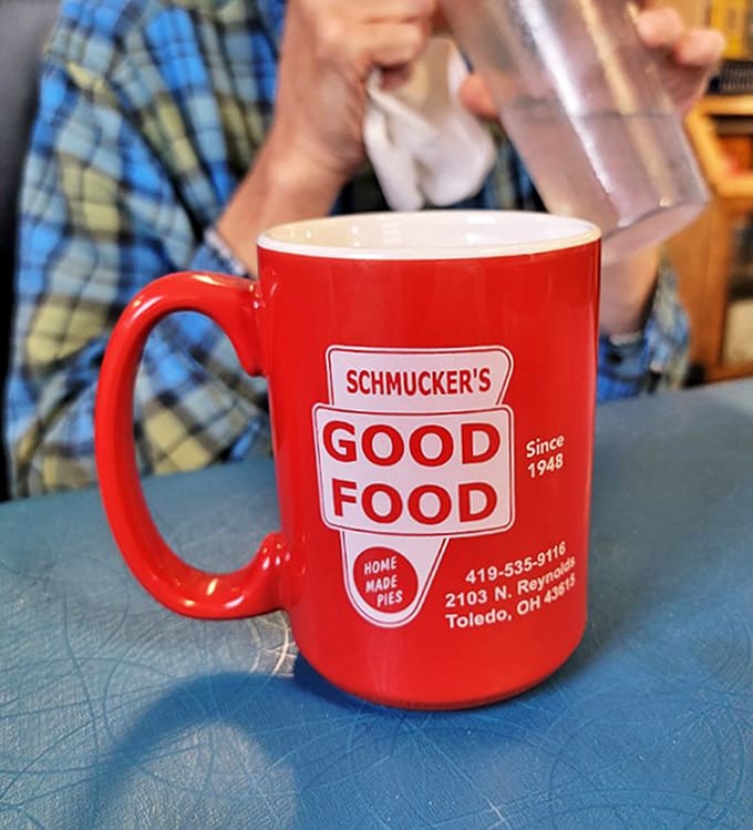 The iconic Schmucker's mug &ndash; a collector's item for locals and a souvenir worth stealing (but don't) for visitors.