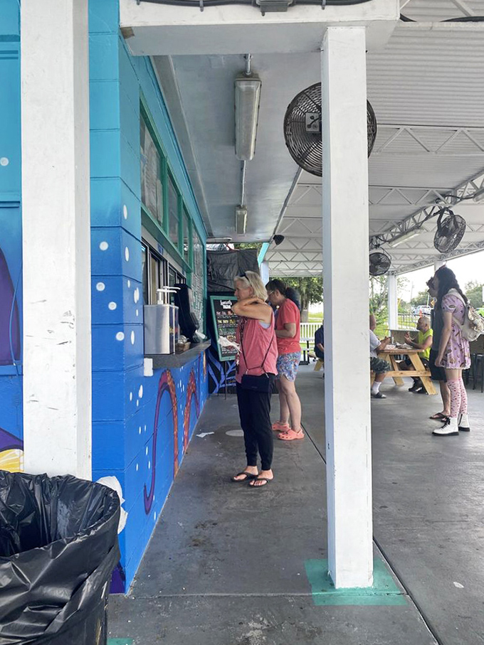 Locals line up for their fix, a daily pilgrimage to the altar of smashed beef and frozen treats that's become a Palm Harbor tradition.