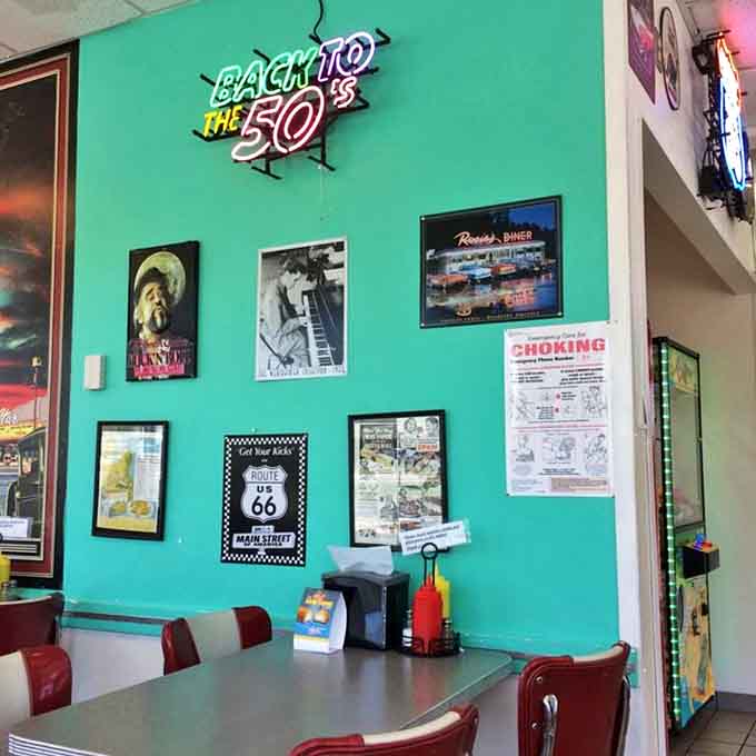 Route 66 signs and vintage memorabilia create an atmosphere where nostalgia isn't manufactured &ndash; it's marinated to perfection.