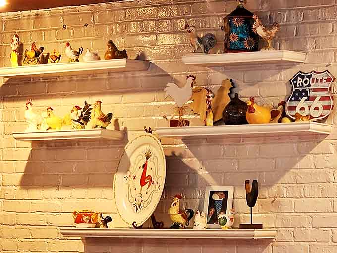 Chicken figurines stand guard over diners from white shelves, a quirky collection that's grown with the restaurant's decades-long history.