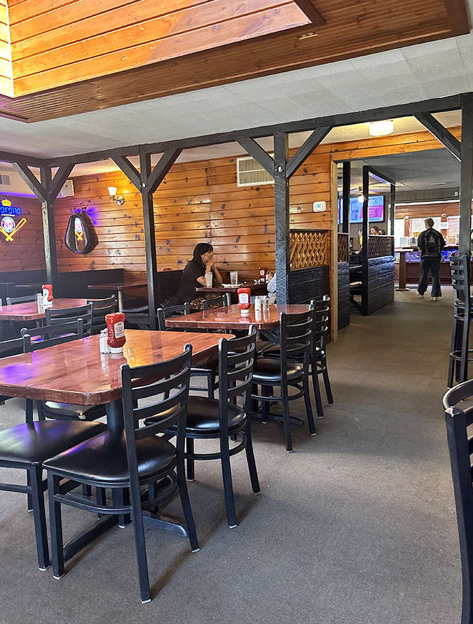 The dining area strikes that perfect balance between spacious and cozy, where every table feels like the best seat in the house.