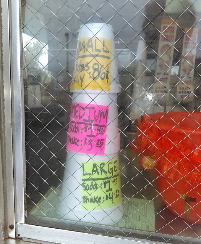 Colorful cups announce daily specials with no-nonsense charm – at Fast Eddie's, the focus is on the food, not fancy digital displays.