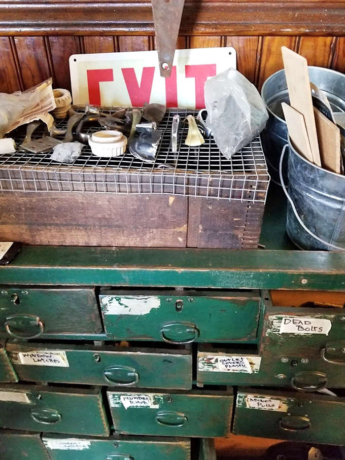 These meticulously labeled green drawers once organized someone's workshop &ndash; now they're industrial poetry, each handwritten tag a tiny story unto itself.