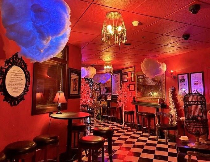 Black and white checkered floors lead you deeper into culinary temptation, with the promise of "Underground" adventures ahead.