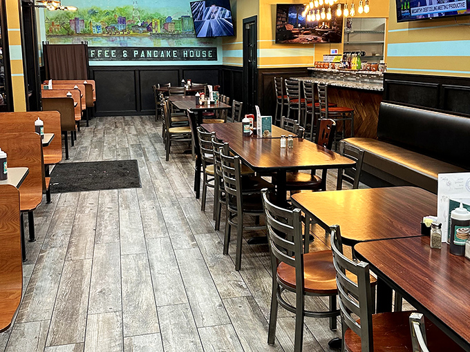 Modern meets cozy in this dining area where every table tells a different story of friendship, family, and fantastic food.