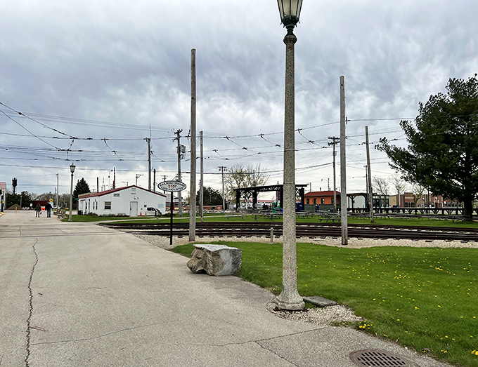 The museum grounds feature authentic railway infrastructure, from signal towers to crossing gates, creating an immersive historical landscape.