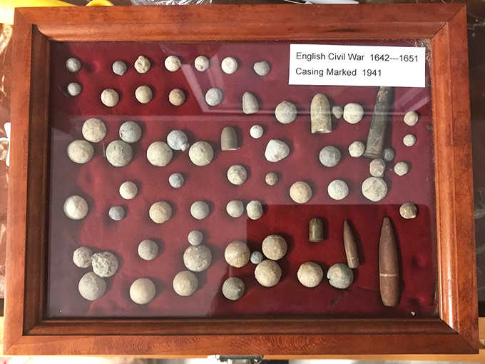 Musket balls and bullet casings from the English Civil War, because nothing says "conversation starter" quite like 400-year-old ammunition displayed in your living room.