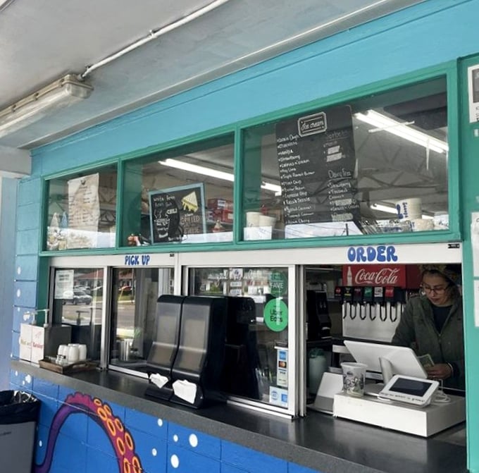 Command central for frozen dreams &ndash; efficient staff work their magic behind glass, transforming orders into edible joy.