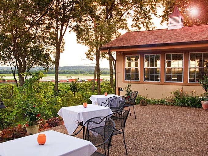 White-clothed tables await diners on this riverside terrace, where every meal comes with a side of spectacular Mississippi River views.