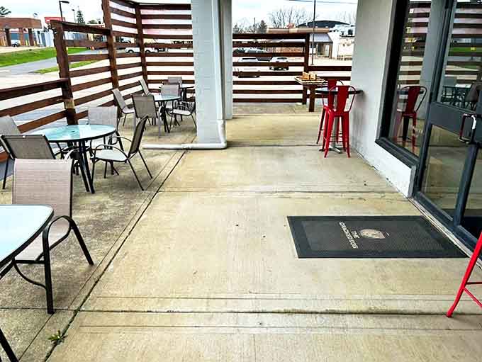 The patio offers fresh air with your fresh coffee. Those wooden privacy screens create a little breakfast oasis in the city.