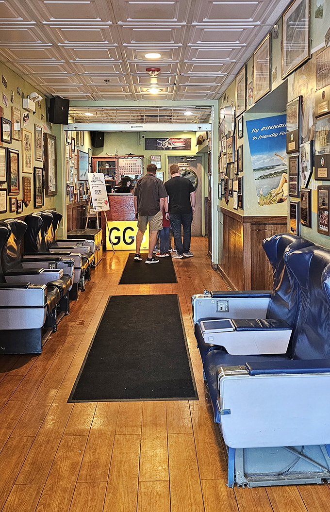 Actual airplane seats serve as waiting area chairs &ndash; probably the only time you'll voluntarily choose airplane seating when not traveling. 