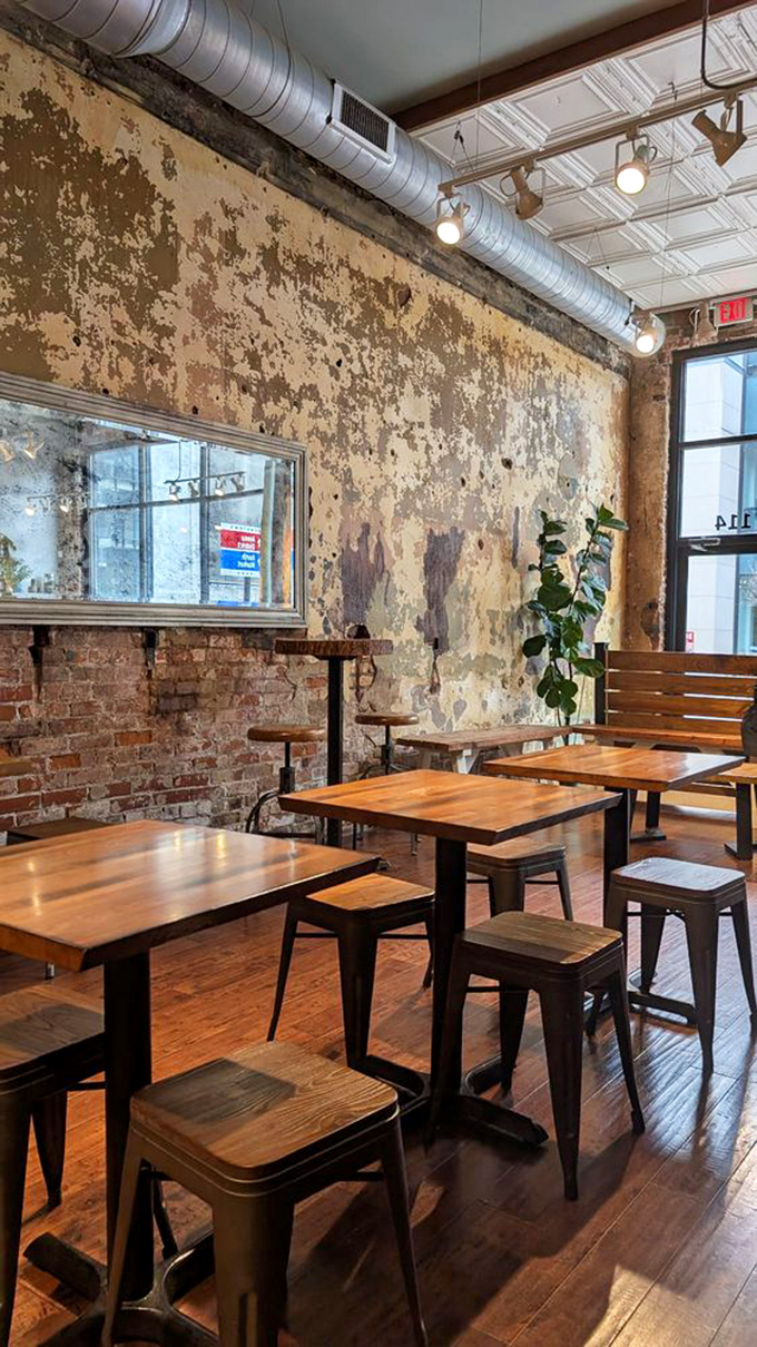 Weathered walls tell stories while simple wooden tables invite you to create your own &ndash; this is where memories are made, one meal at a time.
