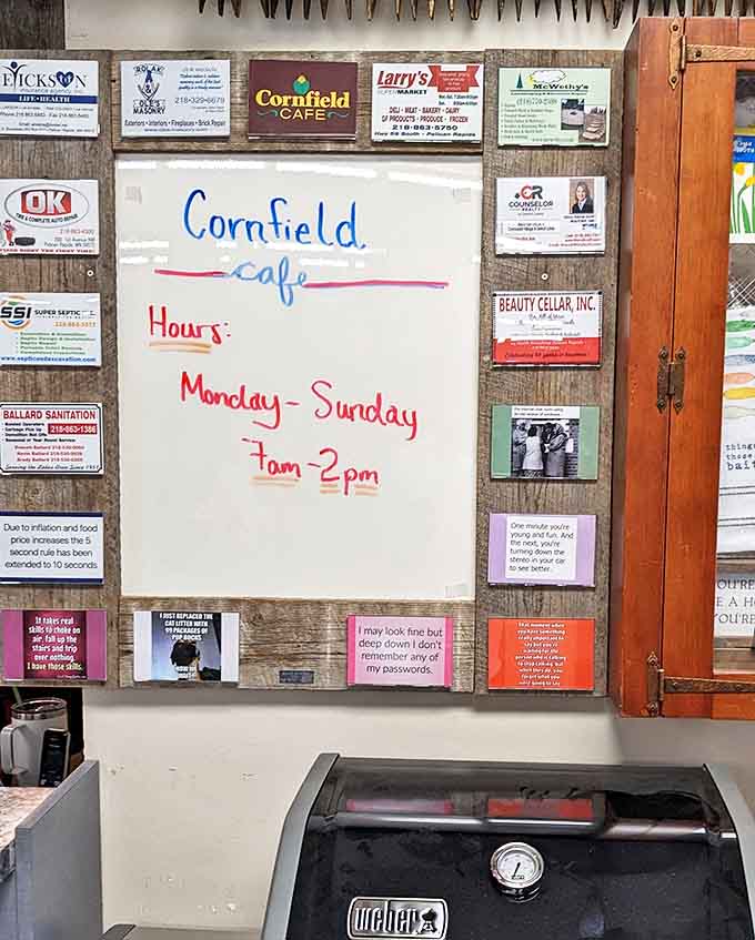 The hours board surrounded by local business cards &ndash; a community bulletin board that tells the story of Pelican Rapids one advertisement at a time.