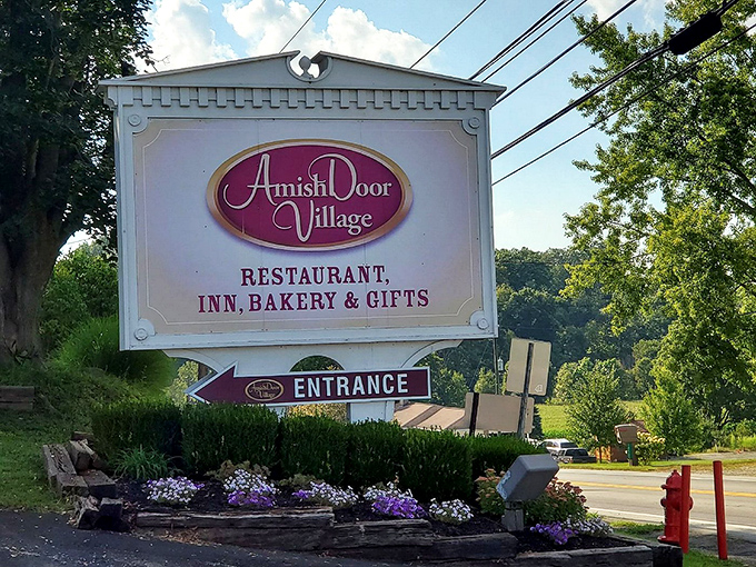 The village sign stands as a beacon to hungry travelers &ndash; like a lighthouse, but instead of preventing shipwrecks, it prevents hangry meltdowns.
