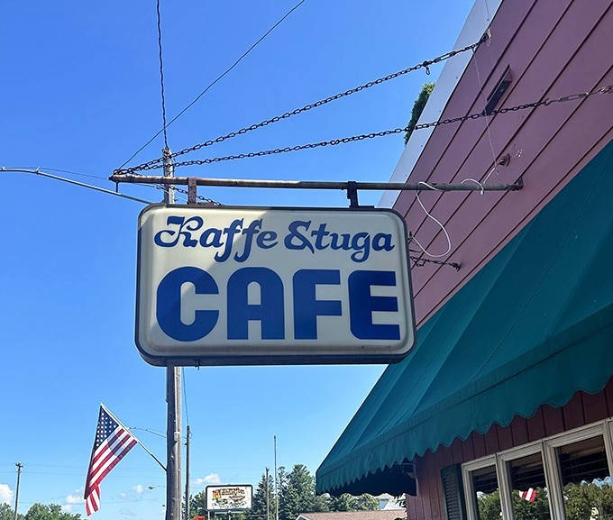 That vintage sign has guided hungry travelers for decades, a blue-and-white beacon promising Swedish-American comfort just ahead.