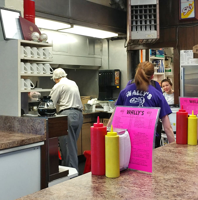 Behind the scenes at Wally's, where the magic happens &ndash; dedicated staff continuing a tradition of burger excellence.