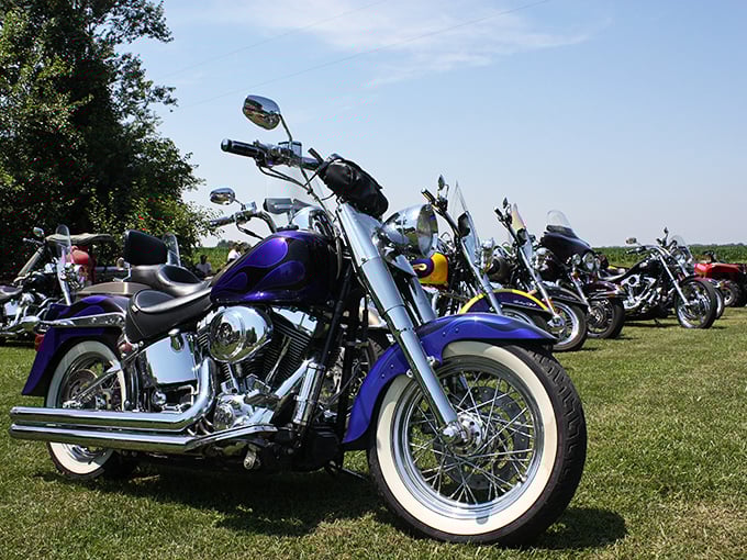 Riders roll into Moonshine! We love seeing all the awesome bikes, chrome, and classic paint jobs gathered in the field.