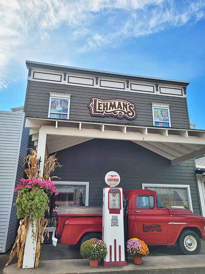 Peering through the glass reveals a carefully arranged living room display, showcasing how these vintage pieces could transform your own home.