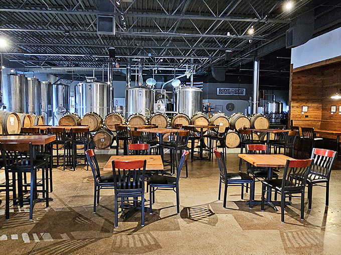 Where the magic happens: gleaming tanks and wooden barrels hint at the alchemy that transforms simple ingredients into liquid gold.