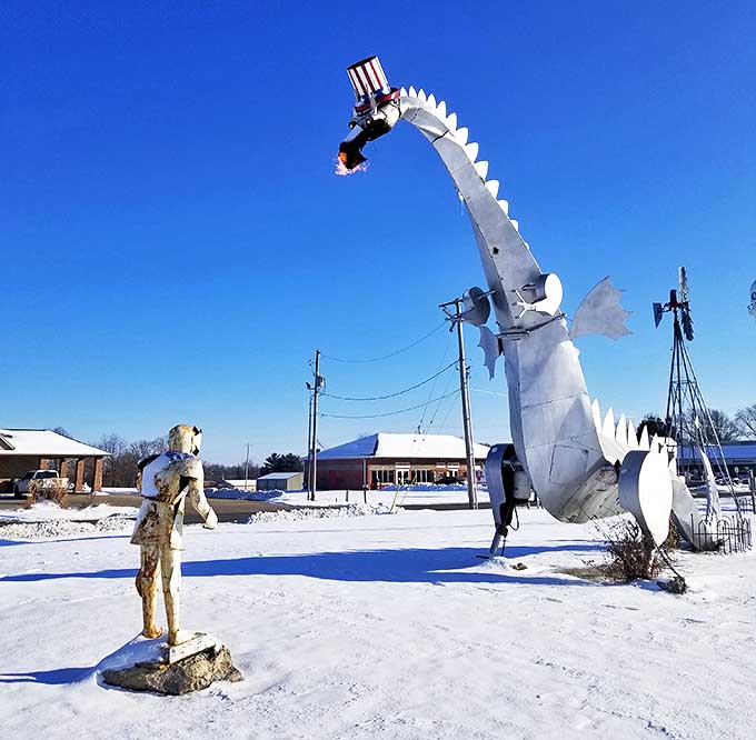 Winter transforms the dragon into something magical, its metal body contrasting beautifully with the snow while its fire brings welcome warmth.