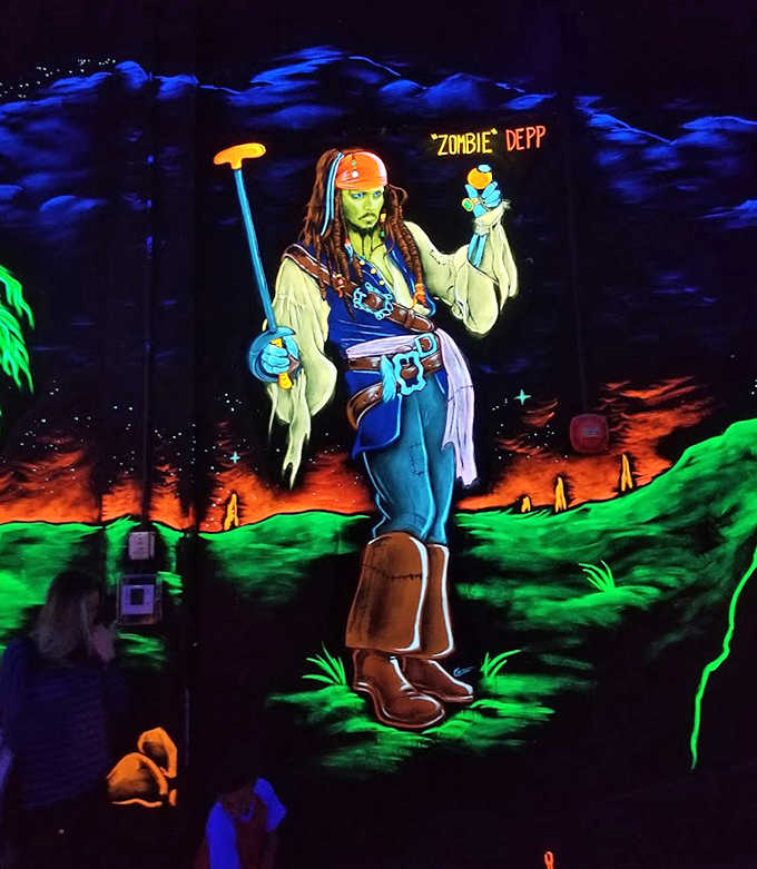 Captain Jack got the ultraviolet treatment! "Zombie Depp" watches over putters with a ghostly gaze and fluorescent dreadlocks.