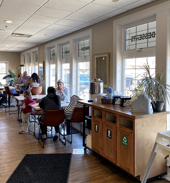 Sunlight streams through windows illuminating tables where customers engage in the serious business of savoring every bite without checking their watches.