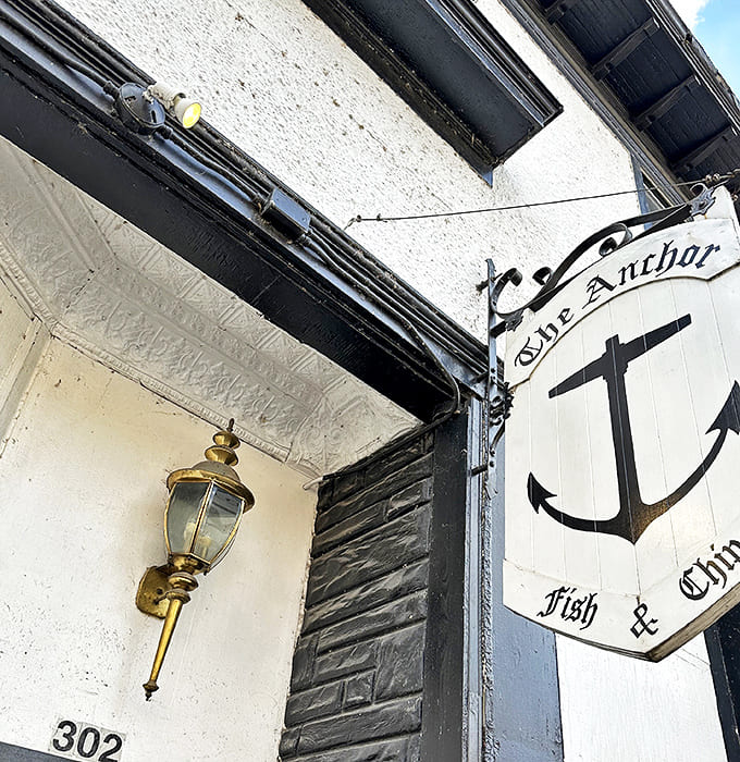 The vintage signage outside The Anchor promises authentic Fish & Chips but delivers so much more.