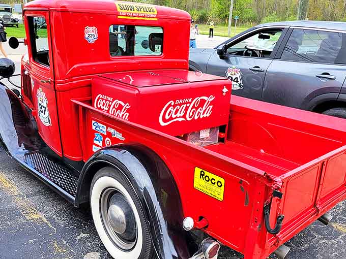 This cherry-red vintage Ford pickup with its Coca-Cola branding reminds us when advertising was an art form, not just a digital annoyance.