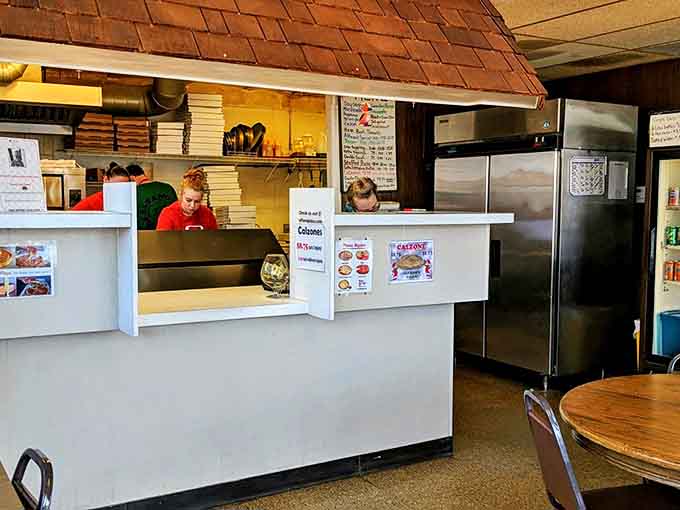 Where the magic happens &ndash; the counter area where orders are placed and pizza dreams come true without unnecessary frills.
