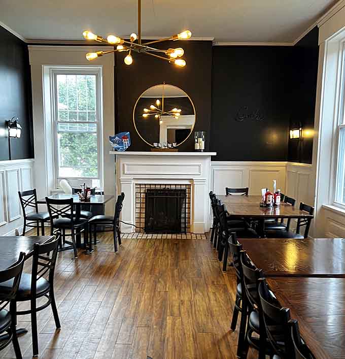 That fireplace and those modern light fixtures create an ambiance that's both sophisticated and welcoming at once.