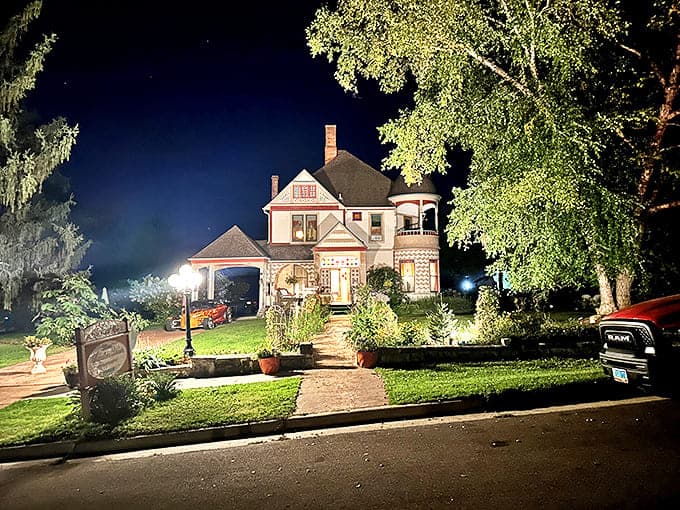 Magical after dark, the Scanlan House stands as a beacon of hospitality, its historic silhouette dramatically lit against the night sky.