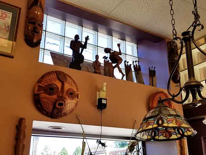 African art and cultural decorations add warmth and character to the space, reminding everyone that great food brings all kinds of people together beautifully.