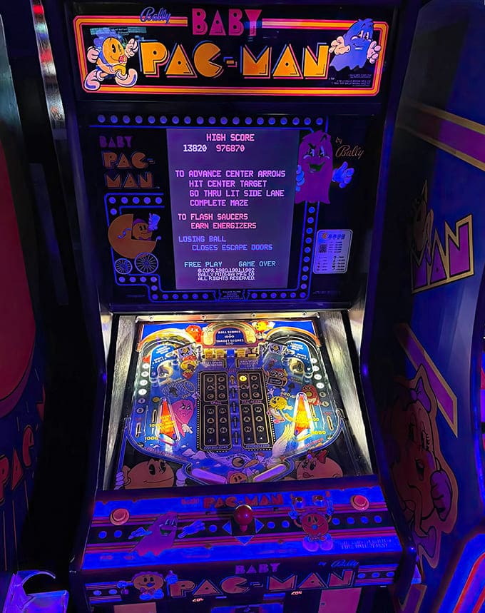 Baby Pac-Man combines video maze-running with physical pinball action, a rare hybrid from gaming's experimental golden age.