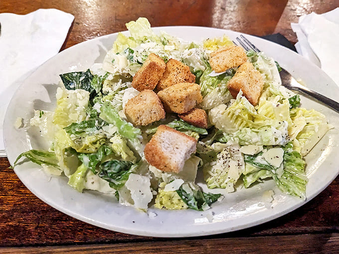 Even the salads get respect here &ndash; fresh greens, house-made croutons, and enough cheese to make you forget you ordered something healthy.