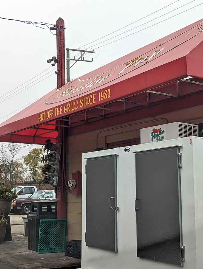 The vintage "As Seen On" sign proudly displays Food Network credentials, though locals knew this place was special long before television did.