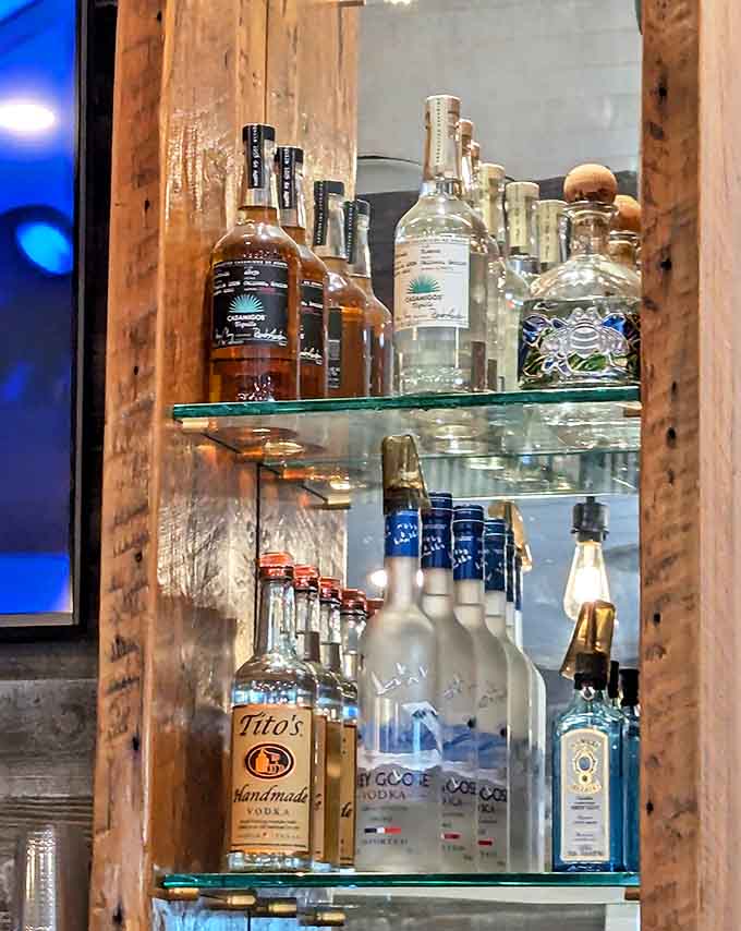 The bar's selection offers everything needed to wash down those legendary pies, from local brews to classic cocktail ingredients.