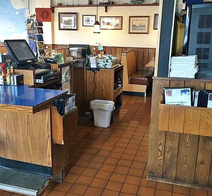 The sleek counter showcases both modern design and functionality, where baristas craft coffee magic to pair with those legendary pancakes.