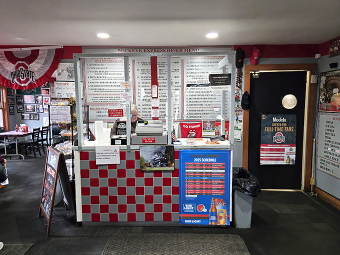 The ordering counter's red and white checkerboard pattern evokes nostalgic diner vibes while keeping the Buckeye theme front and center.