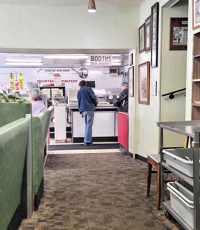 The counter area &ndash; where barbecue dreams come true and diet plans go to die. Note the sign: "We don't serve mean people."