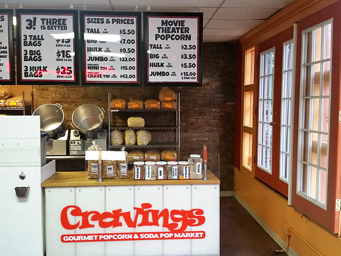 The counter area serves as mission control for your popcorn adventure, where friendly staff help navigate the delicious chaos of too many good options.