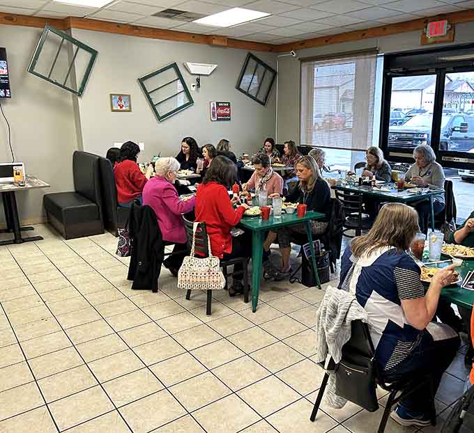 Tables full of satisfied diners enjoying their massive meals, this is what breakfast community looks like in action.