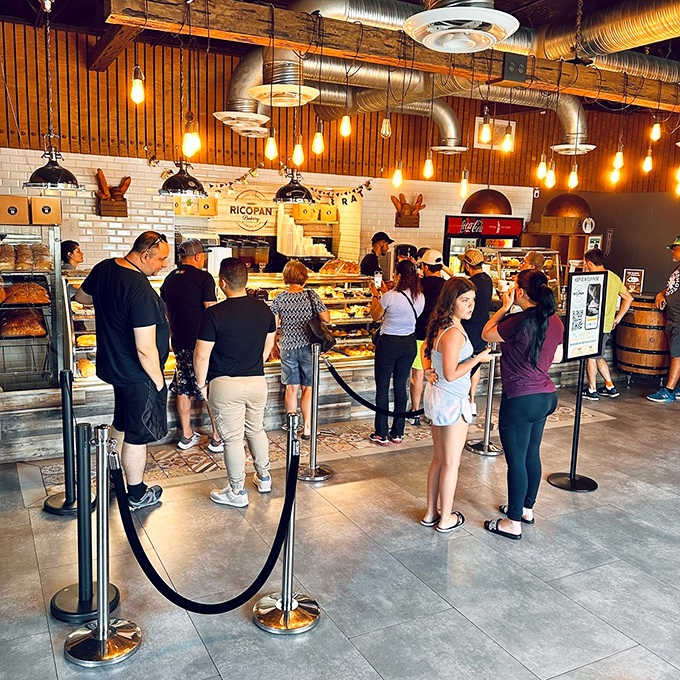 Customers: A diverse crowd gathers at the counter, united by the universal language of good food and the promise of authentic flavors.