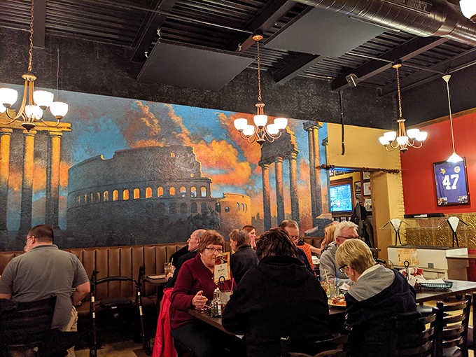 A stunning mural of Rome creates the perfect backdrop for diners enjoying authentic Italian-American cuisine in the heart of Minnesota.