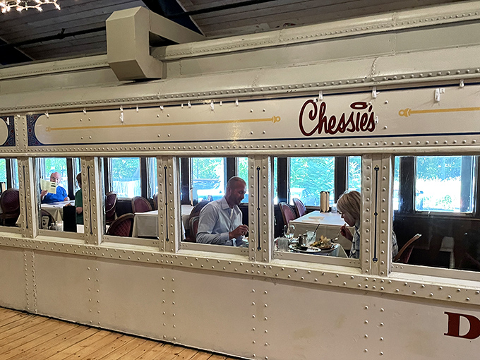 Diners enjoy the unique experience of eating in authentic train cars, where every meal feels like a journey through American culinary history.