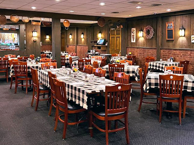 The dining room's warm wood paneling and classic decor create an atmosphere where time slows down and conversations flow freely.