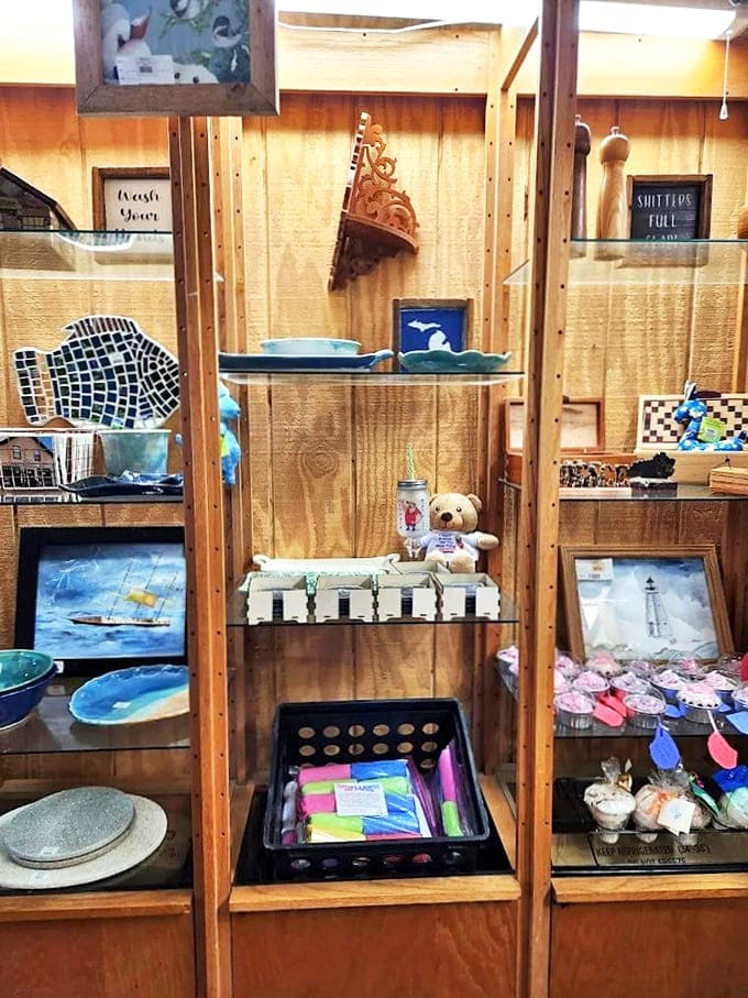 Local artwork and handcrafted items fill the display shelves, offering treasures that capture the spirit of Michigan's Thumb region in tangible form.
