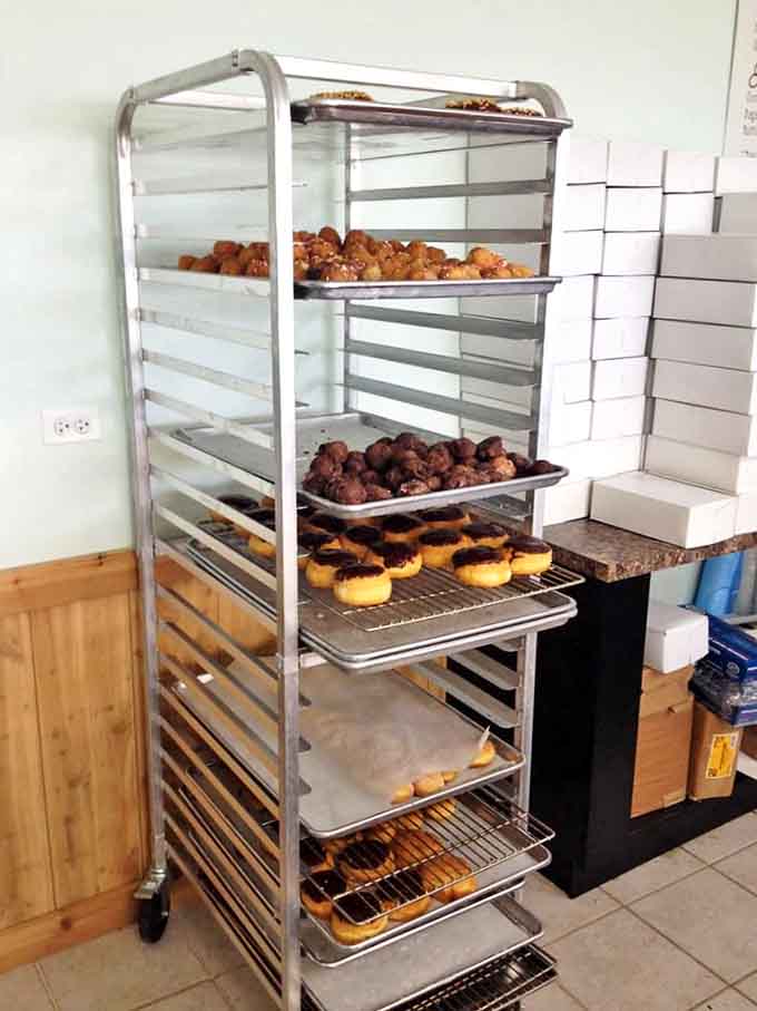 Behind-the-scenes star of the show &ndash; the metal chariot where freshly fried circles cool before their transformation into glazed masterpieces.