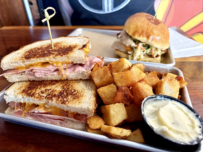 This grilled cheese sandwich has achieved the golden ratio &ndash; perfectly toasted exterior, melty interior, and those home fries deserve their own fan club.