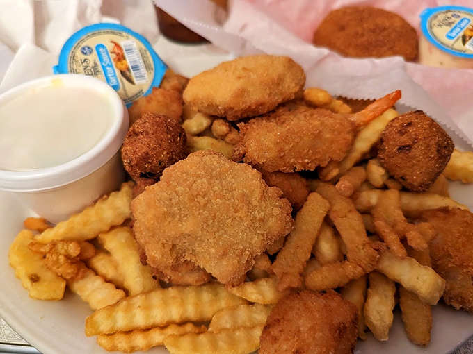 This fisherman's basket is piled high with enough fried seafood to make you understand why people drive from neighboring counties for Andy's cooking.